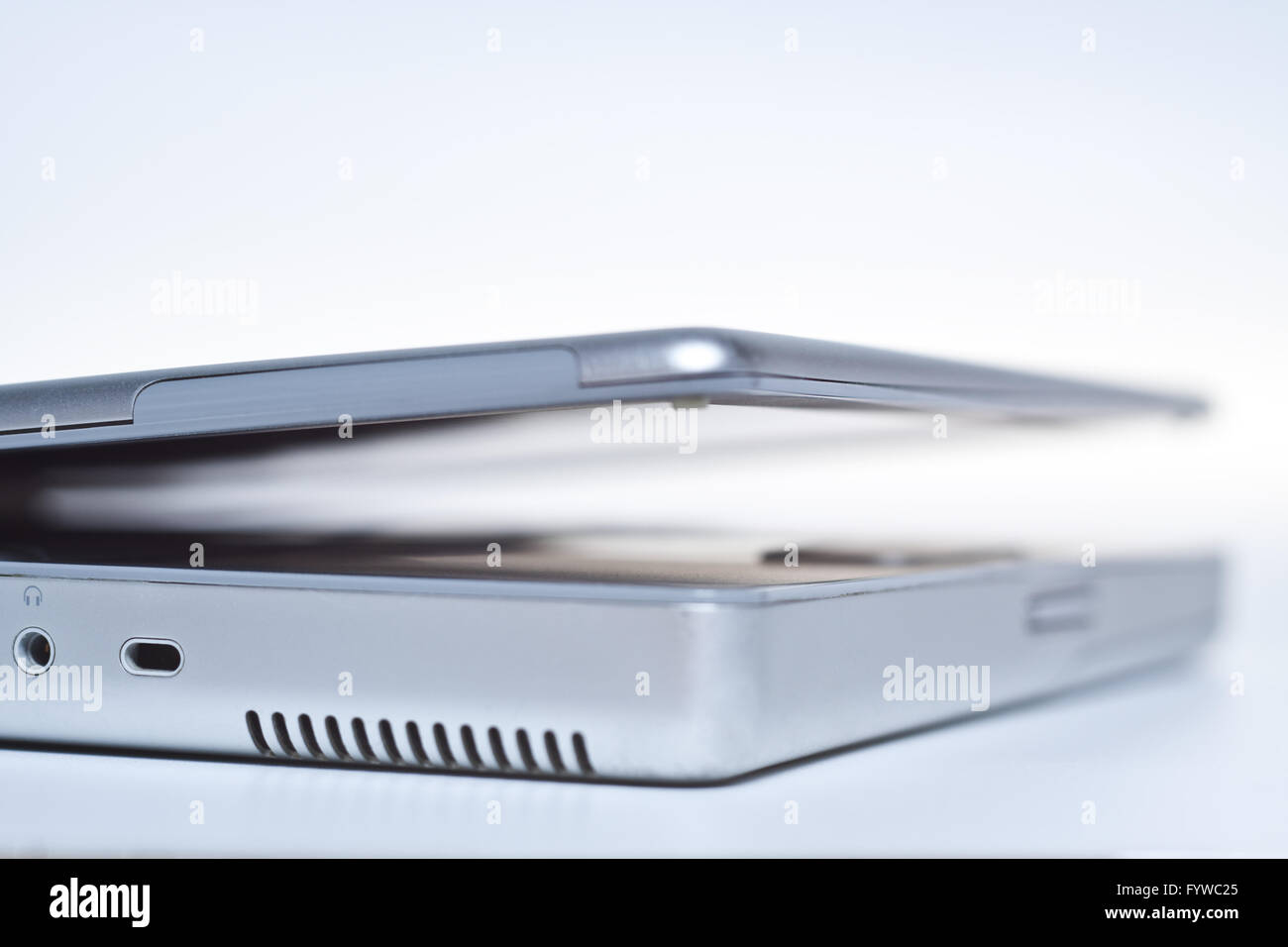 Silver laptop screen dark background hi-res stock photography and ...