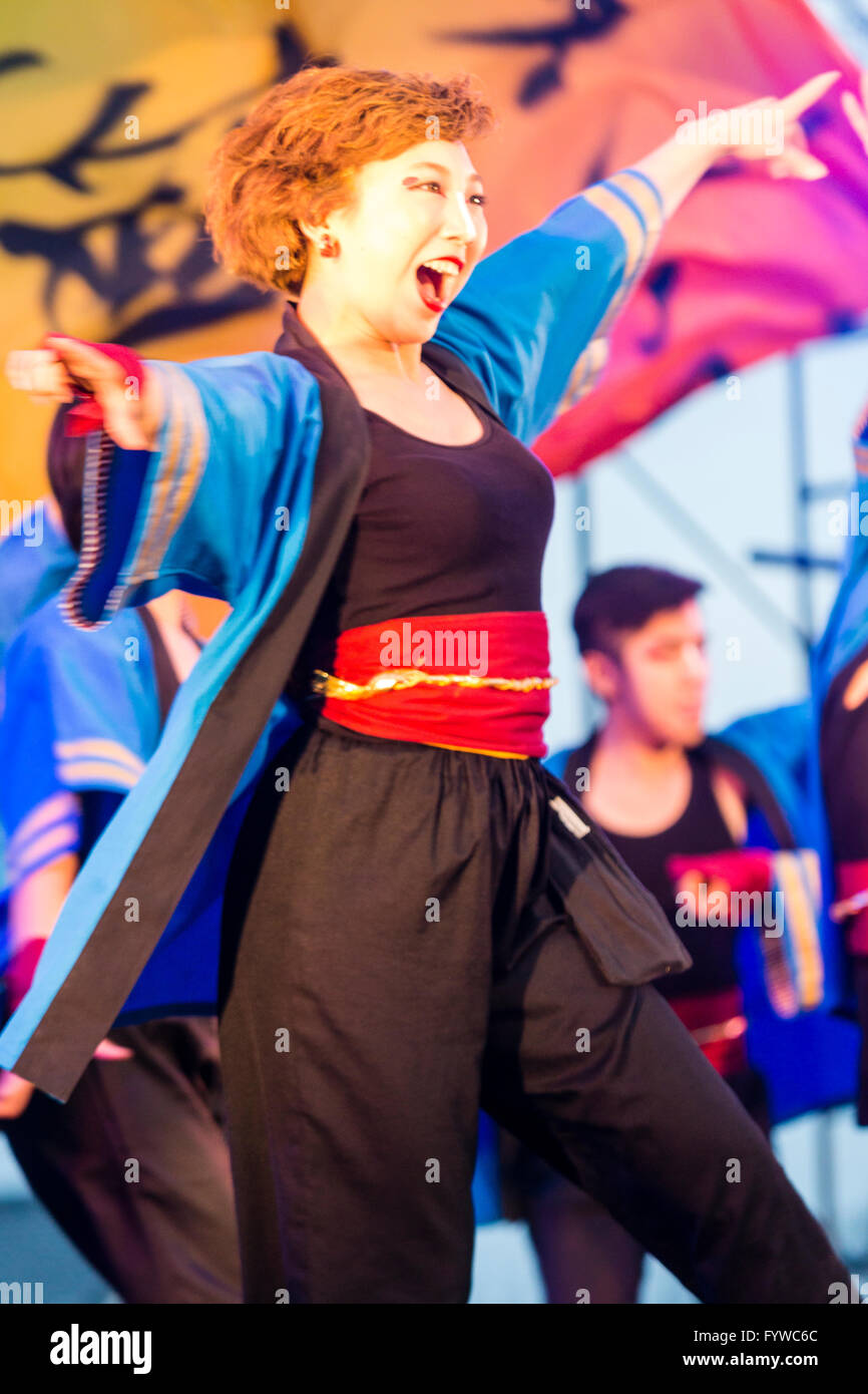 Close up of Japanese woman dancer in blue yukata jacket, dancing at ...