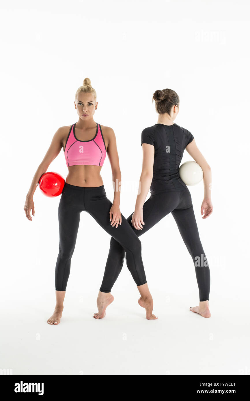Two girls with balls Stock Photo - Alamy