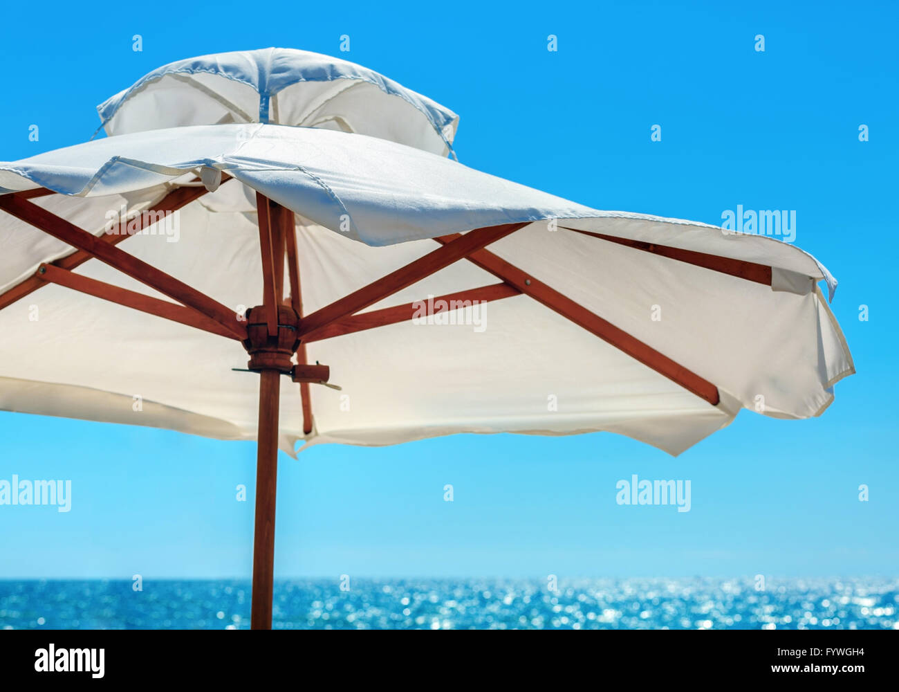 White parasol hi-res stock photography and images - Alamy