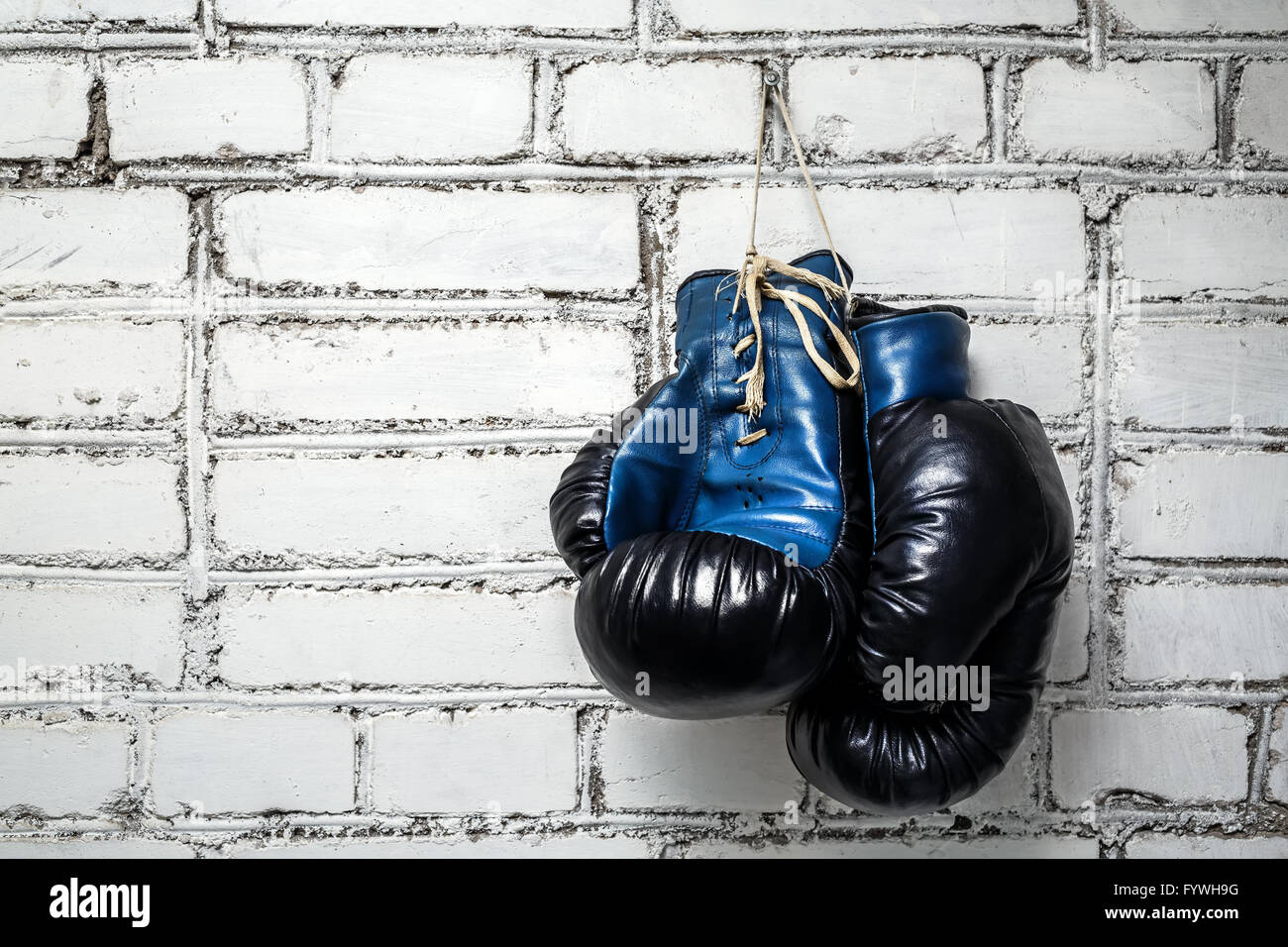 Boxing gloves hanging up hi-res stock photography and images - Alamy