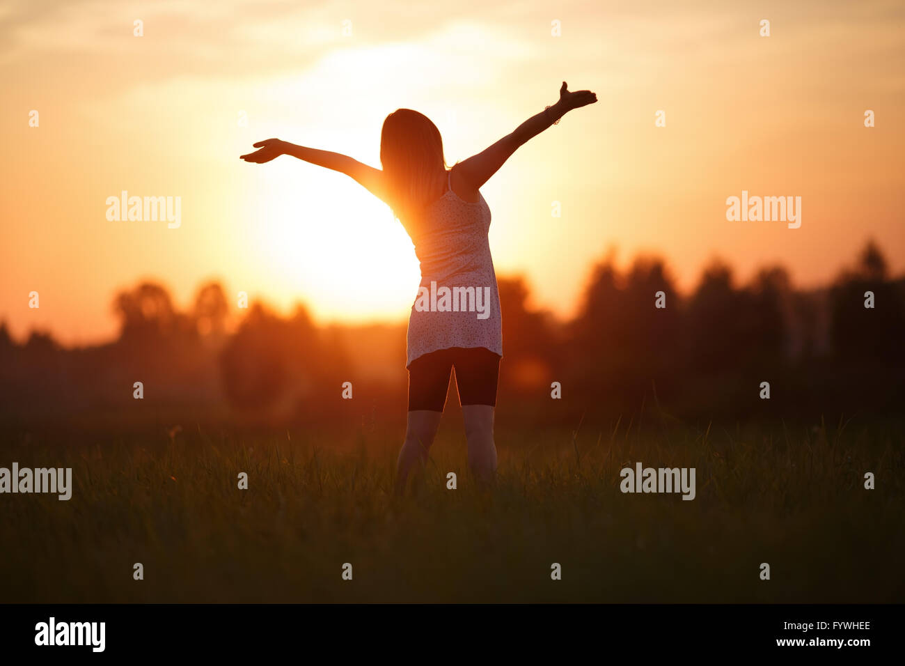 Enjoying the sunset Stock Photo - Alamy
