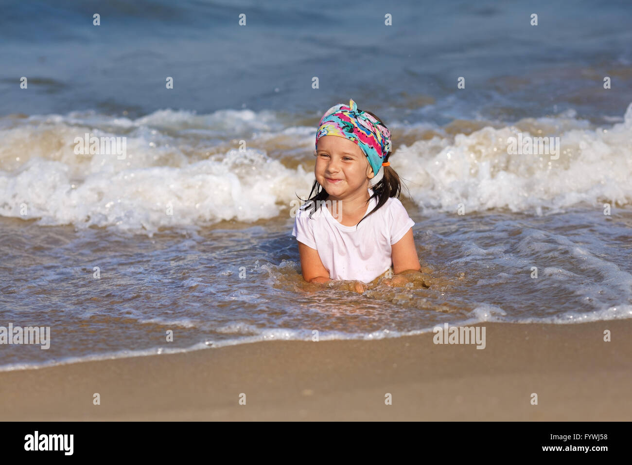 Child on the beach Stock Photo - Alamy