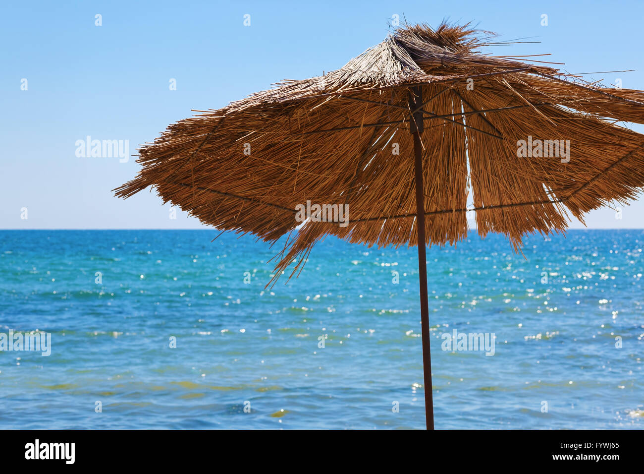 Sun shade umbrella thatched hi-res stock photography and images - Alamy