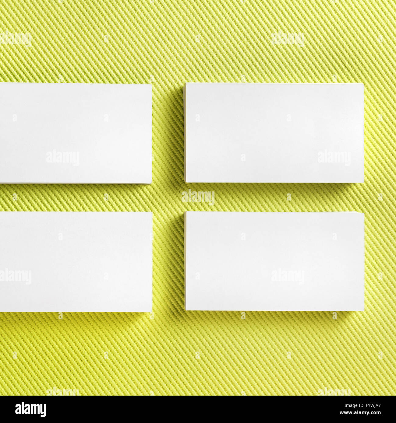 Blank business cards on green background Stock Photo - Alamy