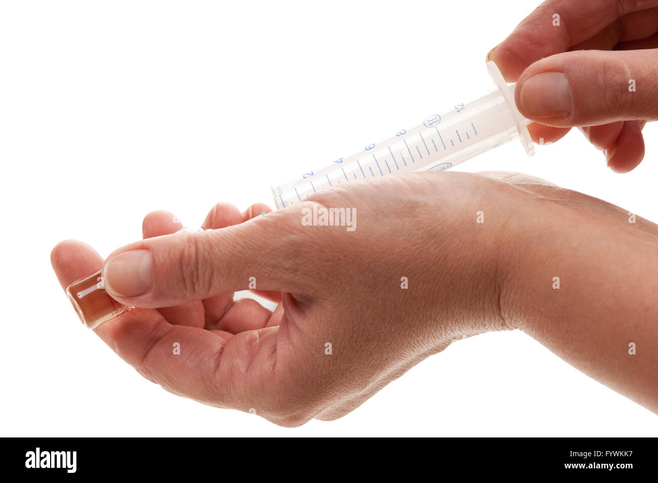 syringe in hand Stock Photo - Alamy