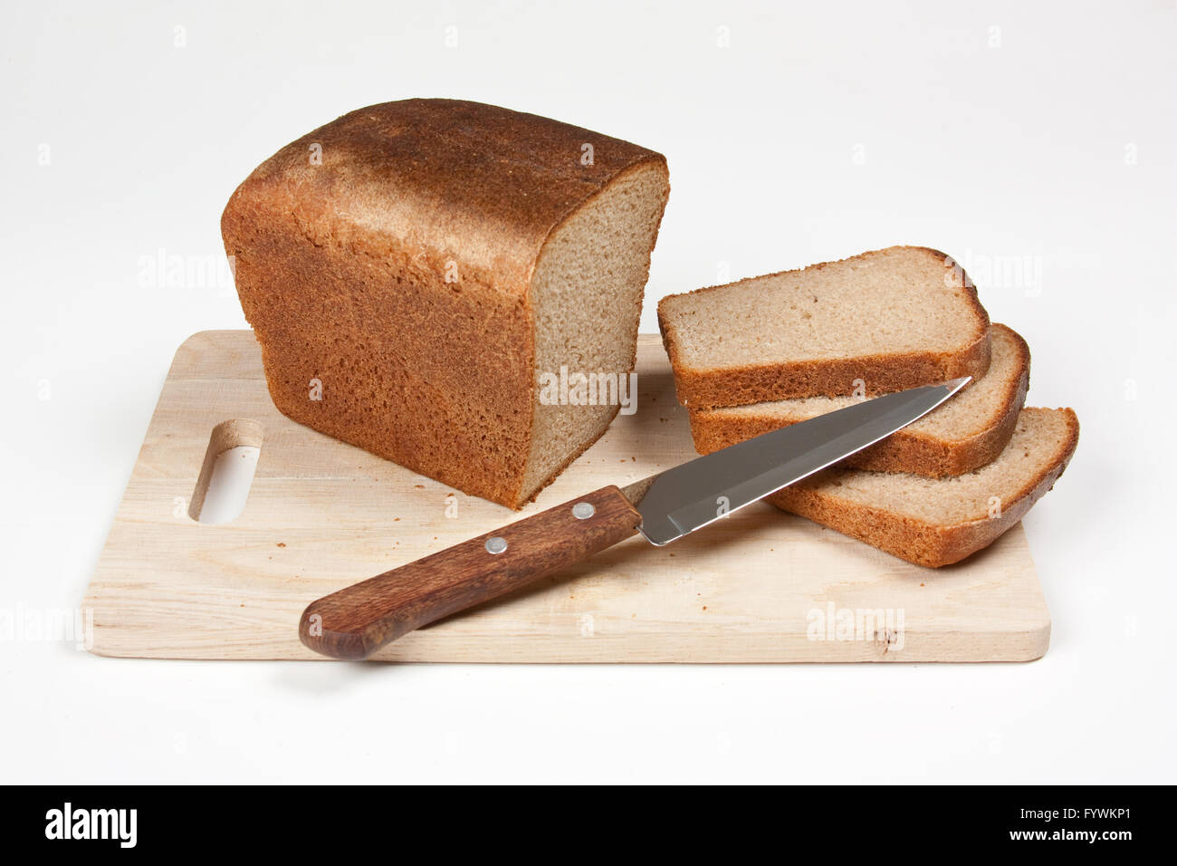 sliced rye bread and knife Stock Photo - Alamy