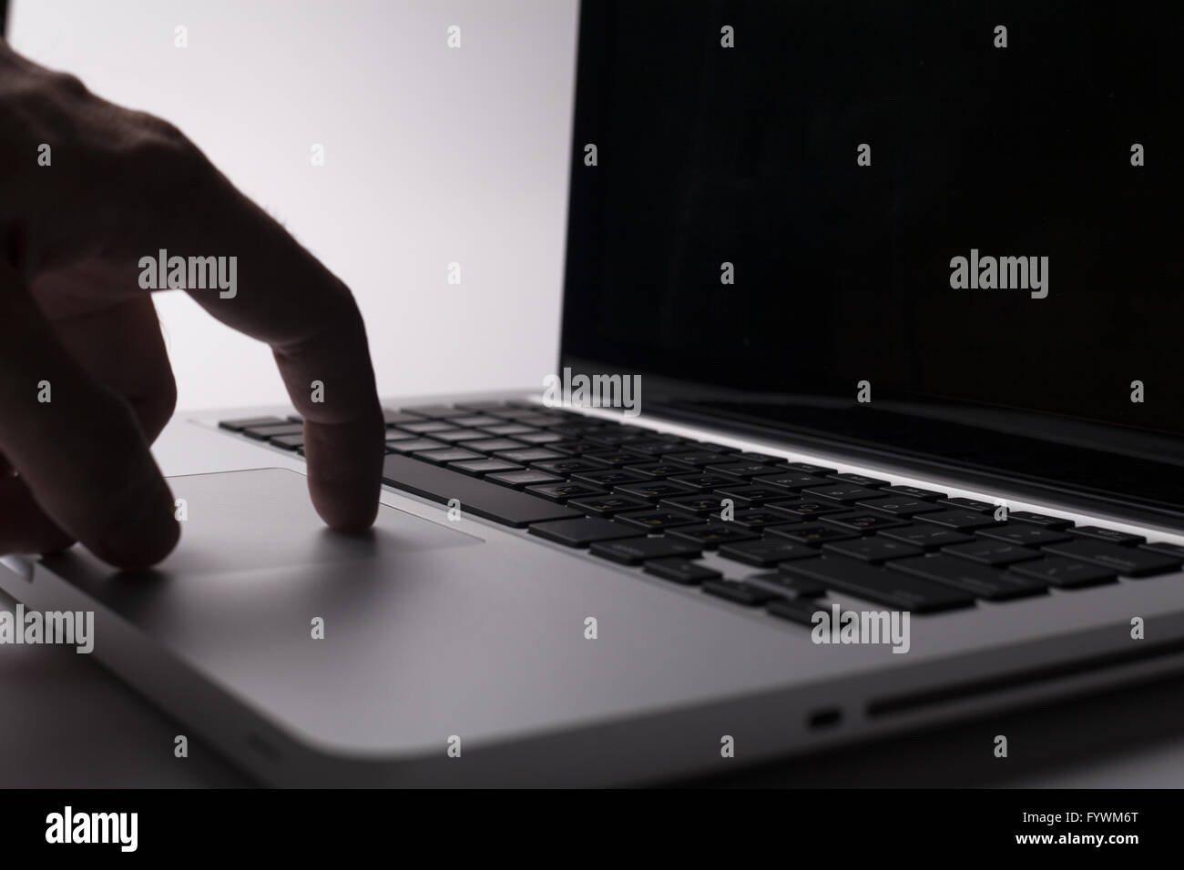 Finger on trackpad hi-res stock photography and images - Alamy
