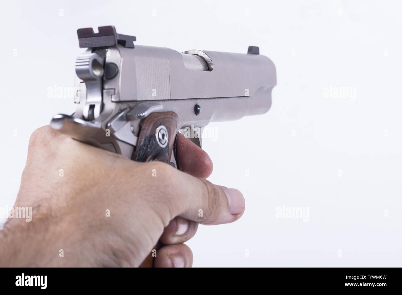 Aiming shooting firearm revolver hi-res stock photography and images ...