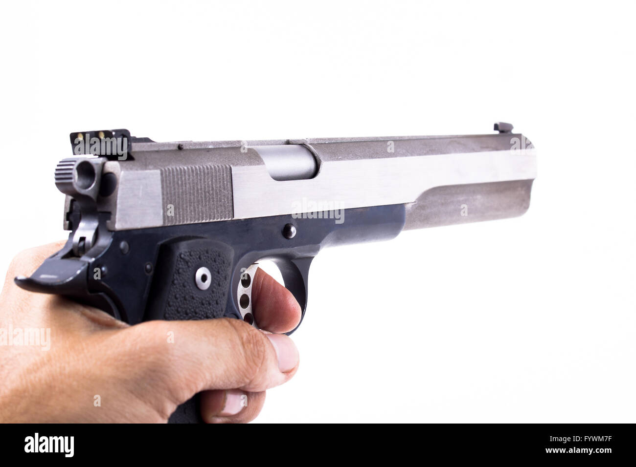 Hand holding silver gun hi-res stock photography and images - Alamy