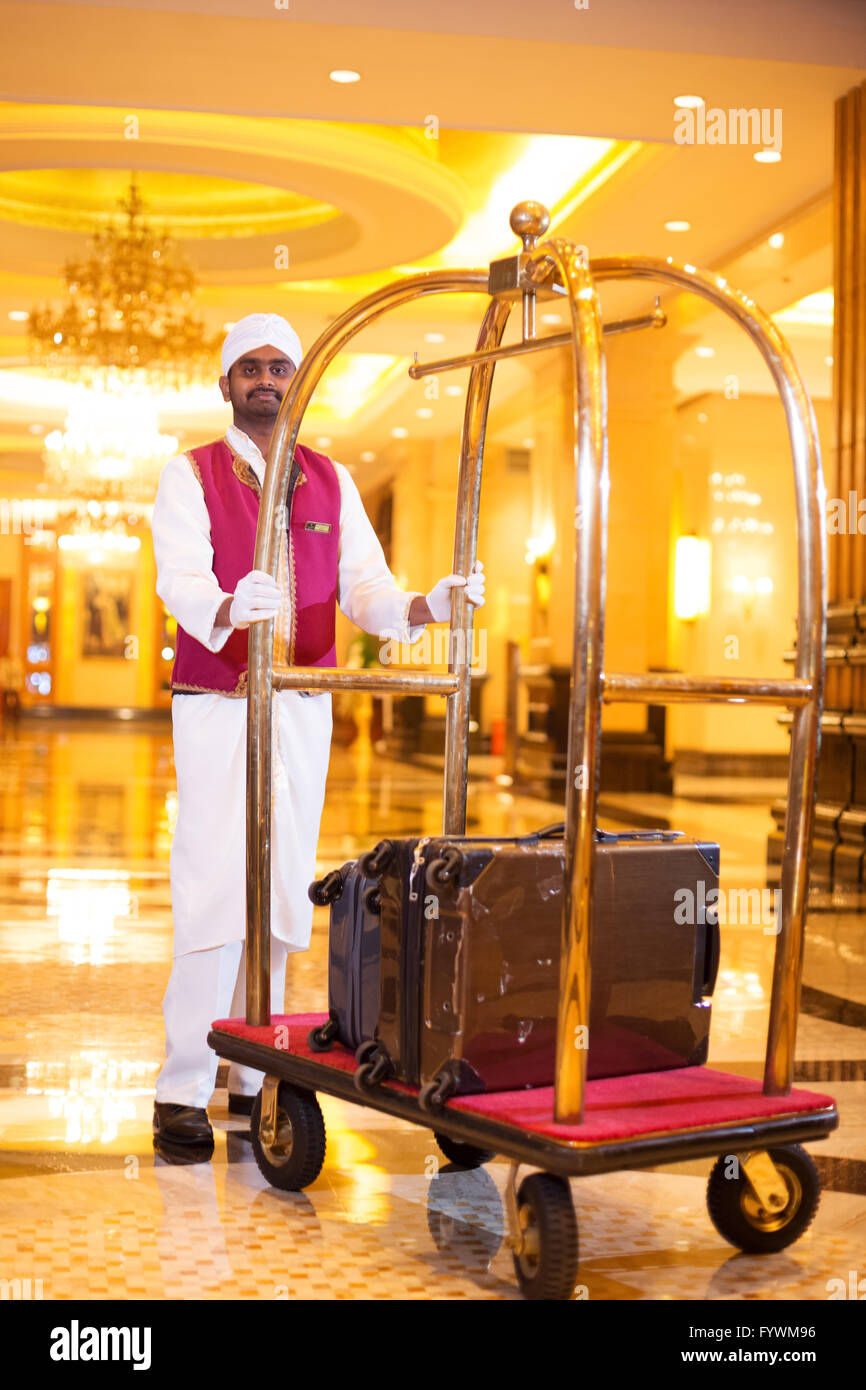 hotel porter servicing for customer Stock Photo - Alamy