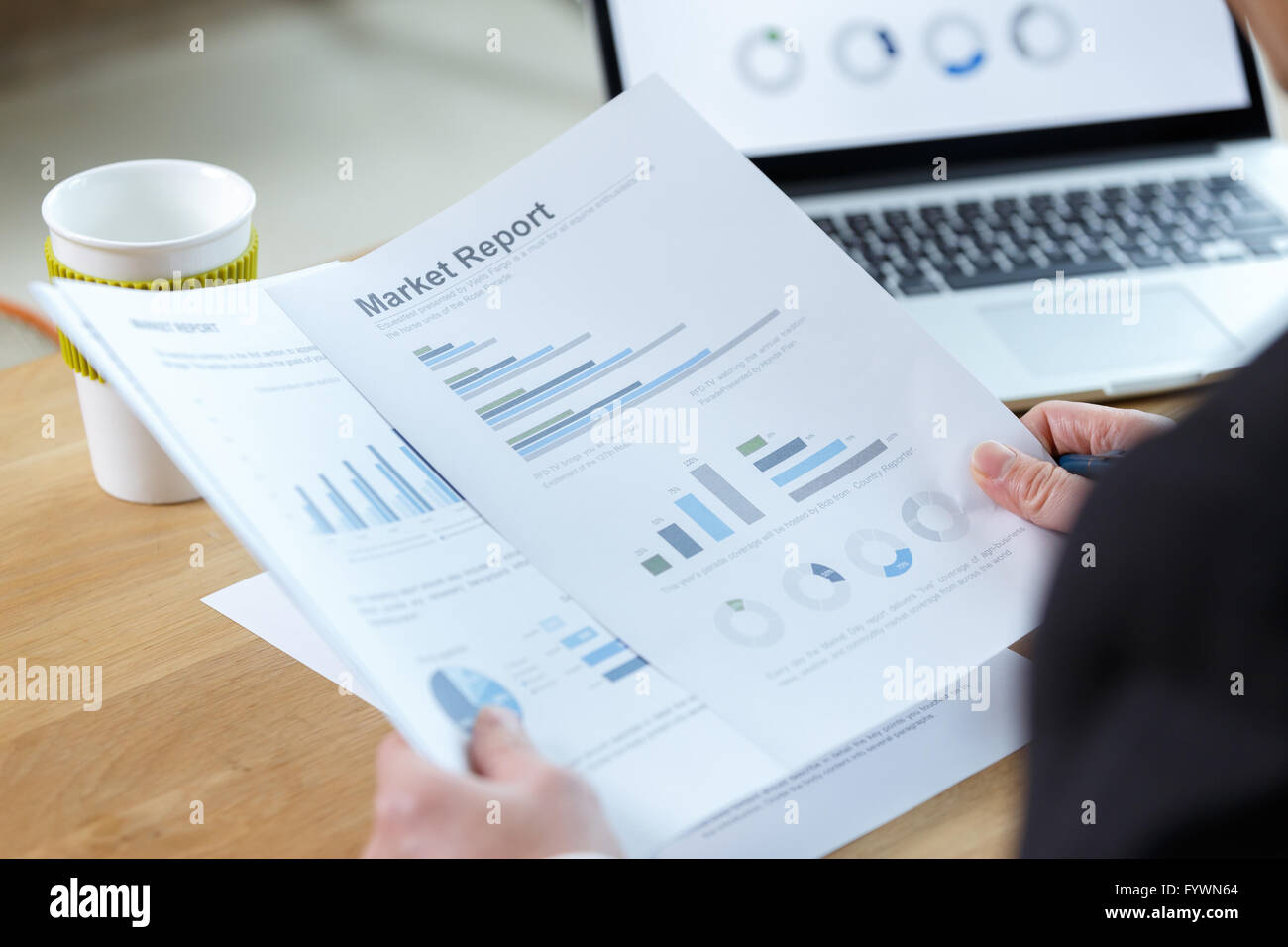 businessman checking financial reports Stock Photo - Alamy