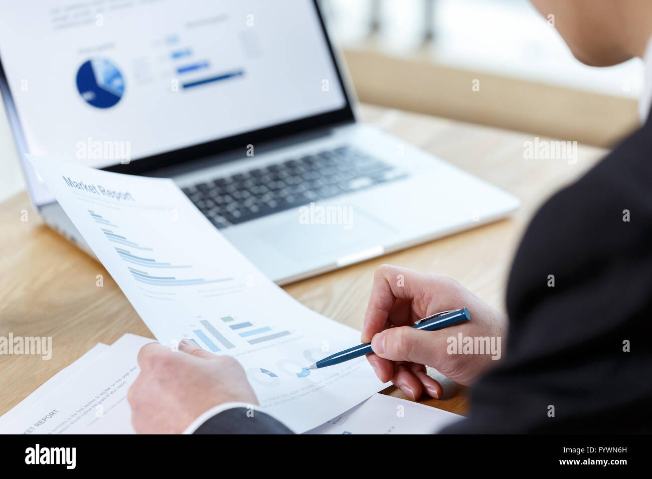 businessman checking financial reports Stock Photo - Alamy