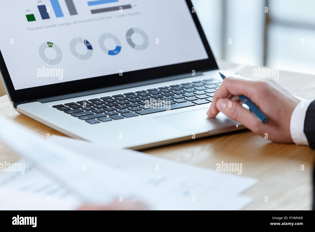 businessman checking financial reports Stock Photo - Alamy