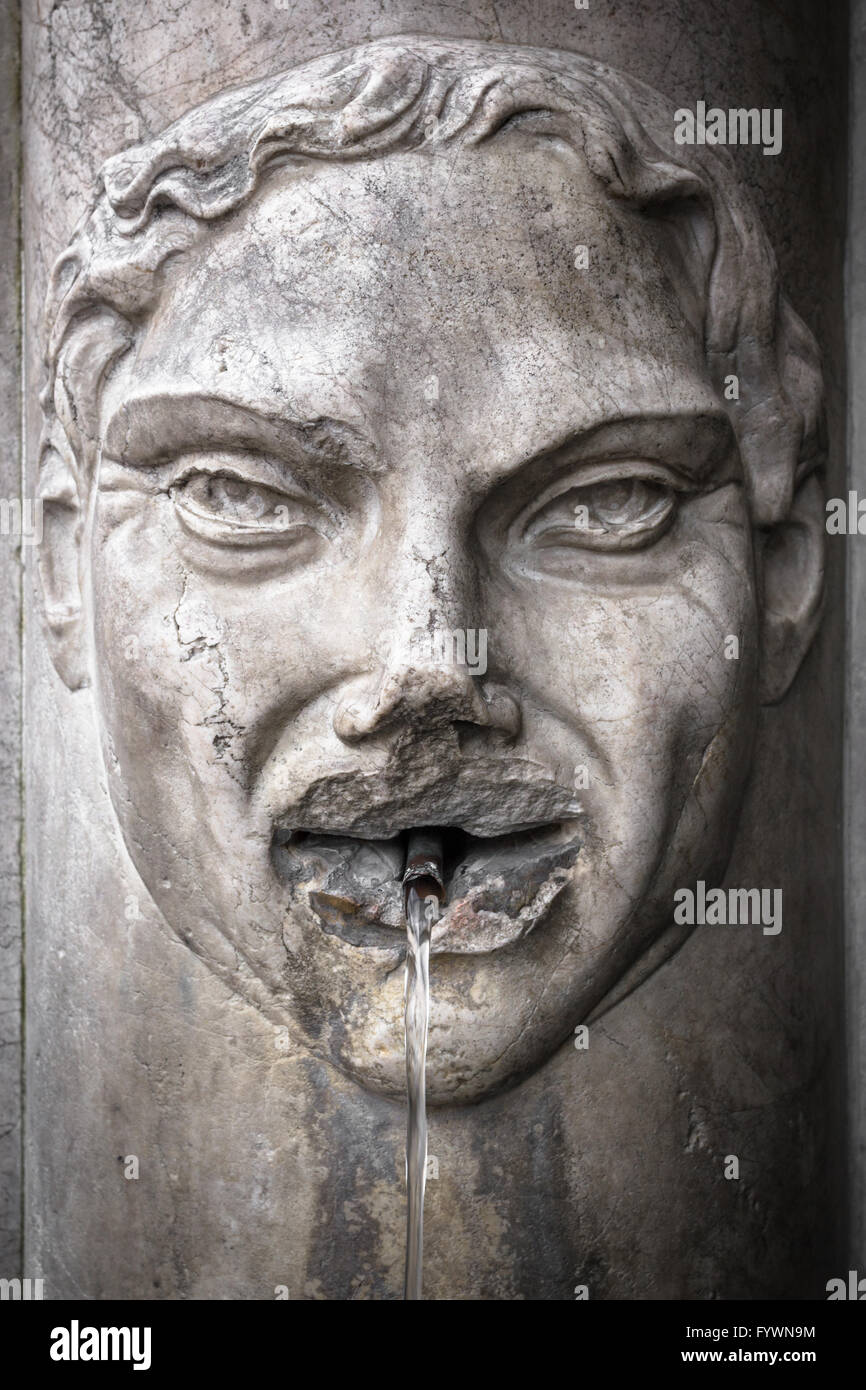Fountain with face Stock Photo - Alamy