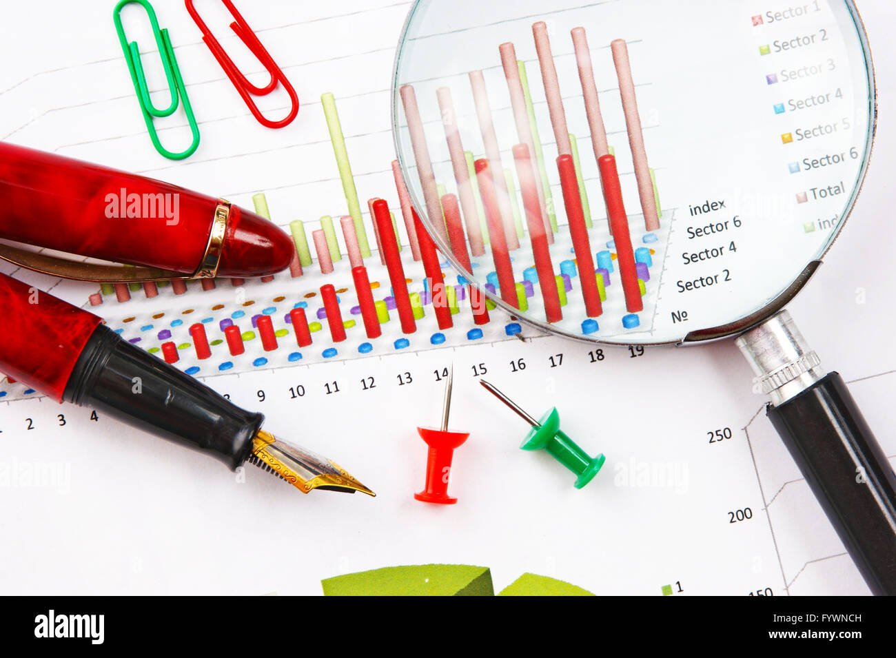 magnifying glass and the working paper Stock Photo - Alamy