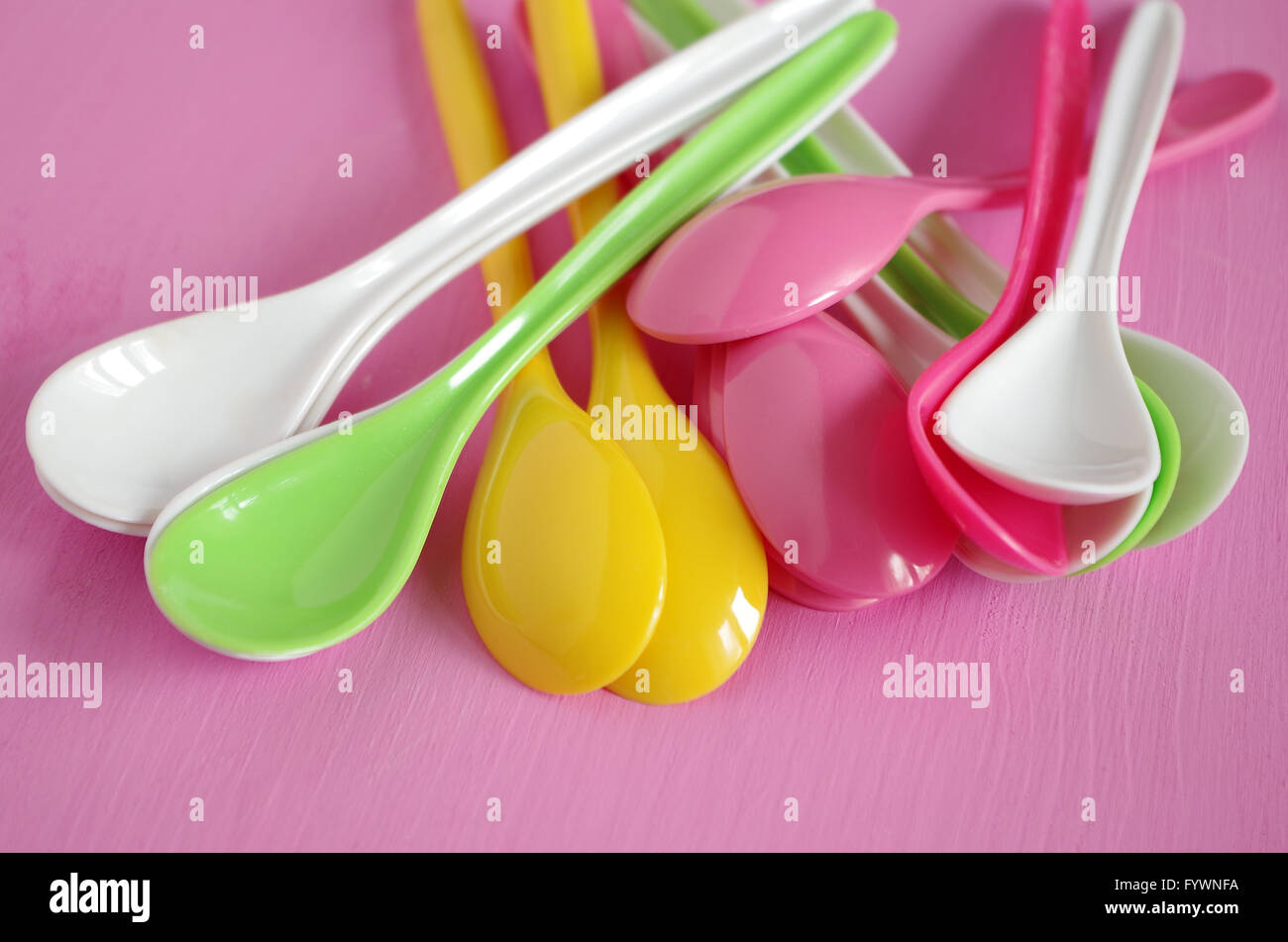 Plastic spoon colourful hi-res stock photography and images - Alamy