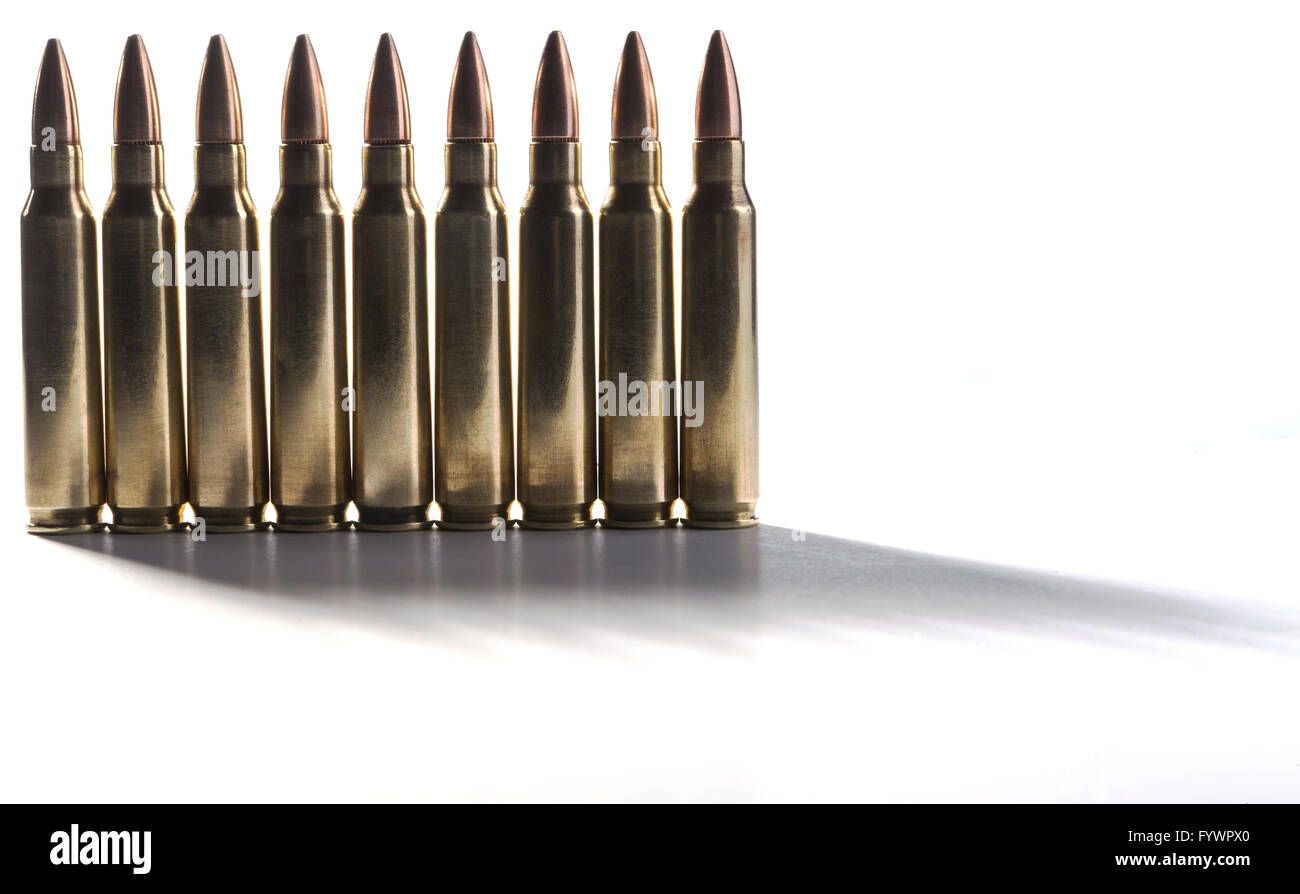 Row shiny rifle bullets standing hi-res stock photography and images ...