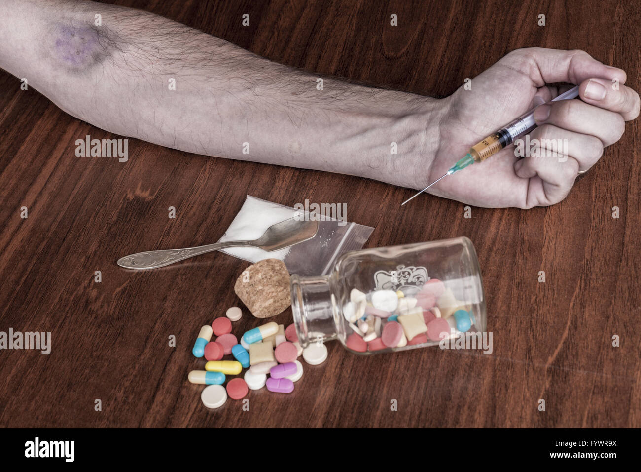 Syringe in Hand Stock Photo - Alamy