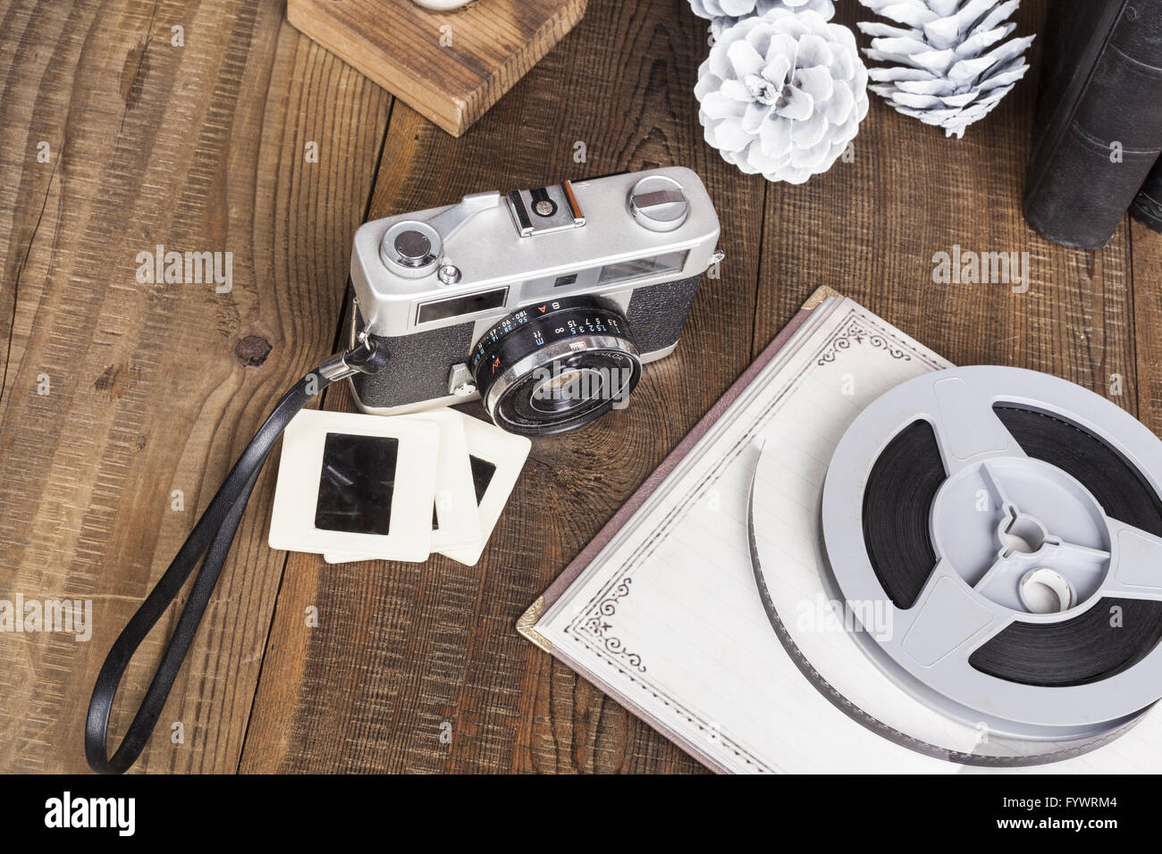 Camera and Film Roll Stock Photo - Alamy