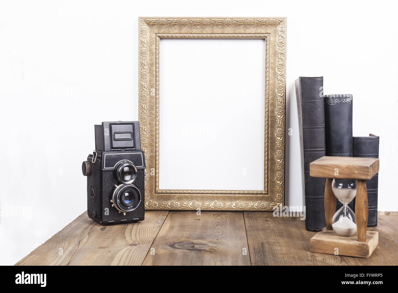 Golden Frame With Hourglass Stock Photo - Alamy