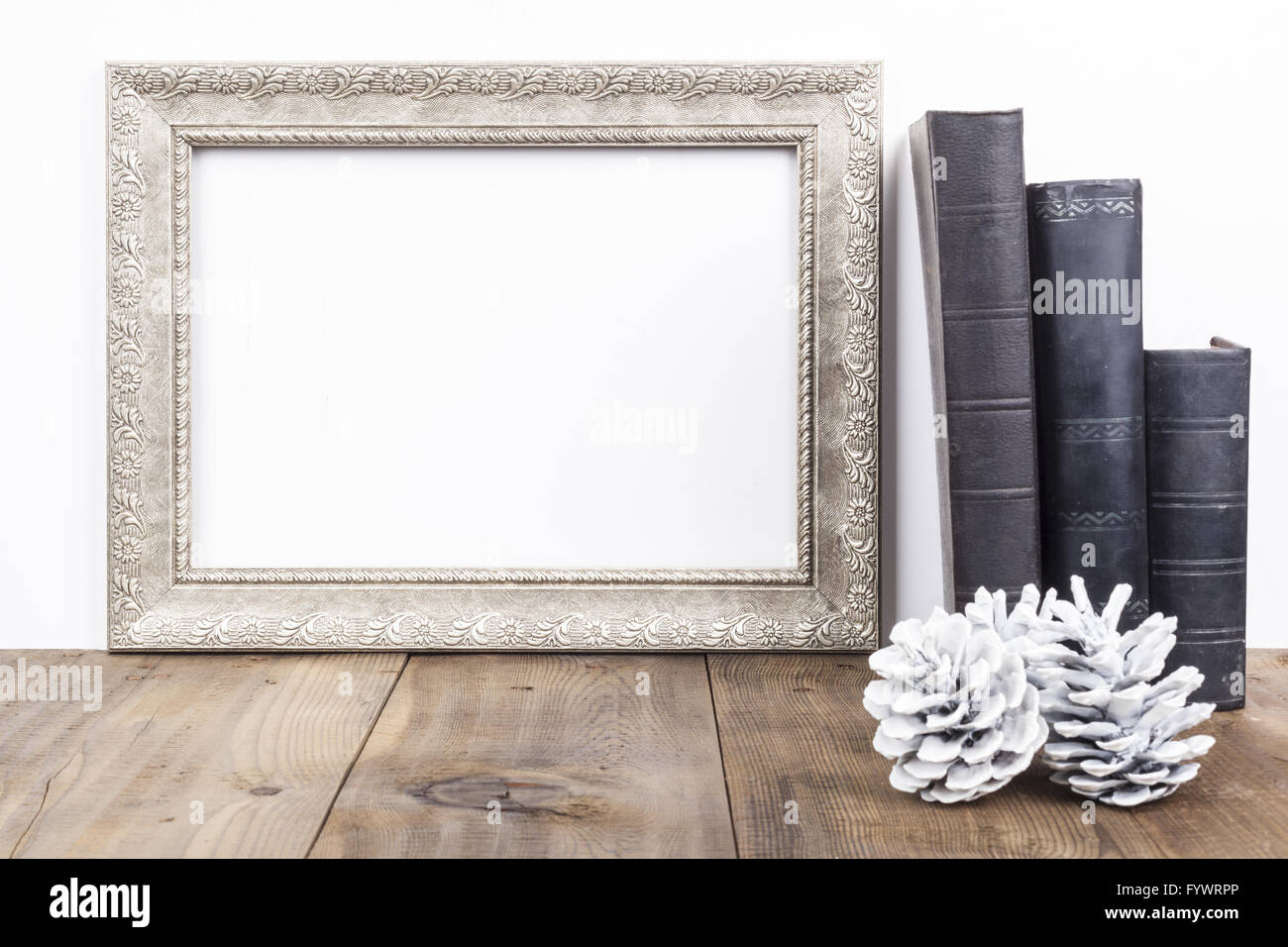 Silver Frame With Books Stock Photo - Alamy
