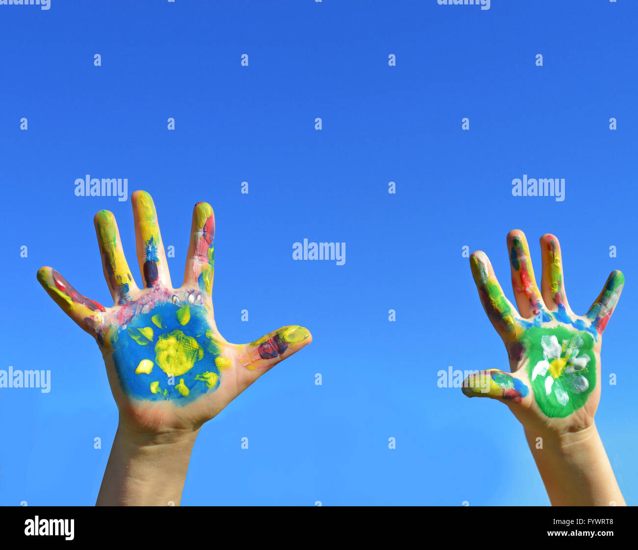 Blue painted hands hi-res stock photography and images - Alamy