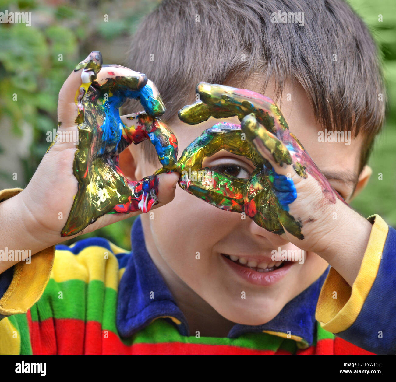 Hands in paint Stock Photo - Alamy