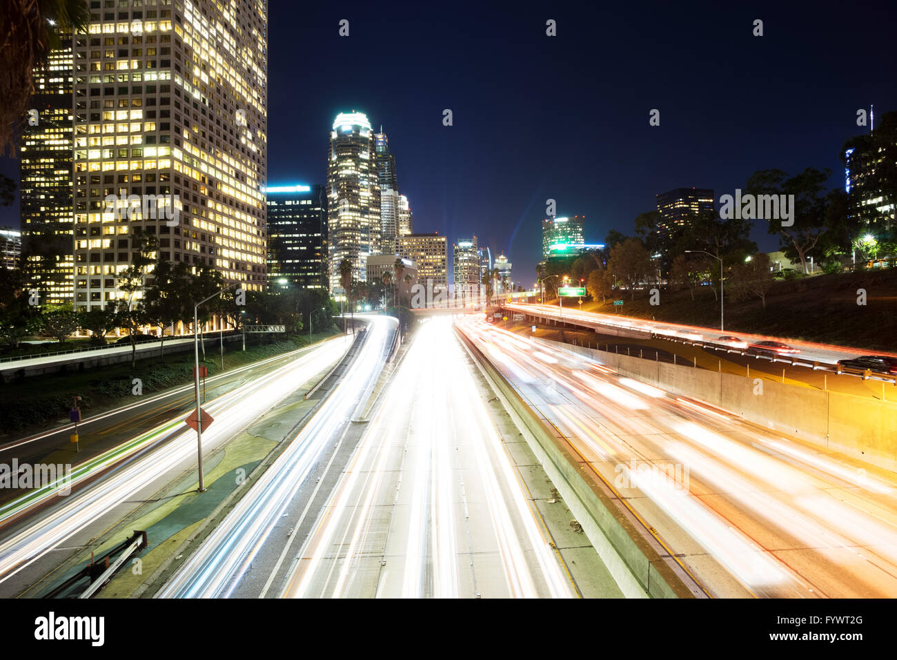 traffic on urban road and building at night Stock Photo - Alamy