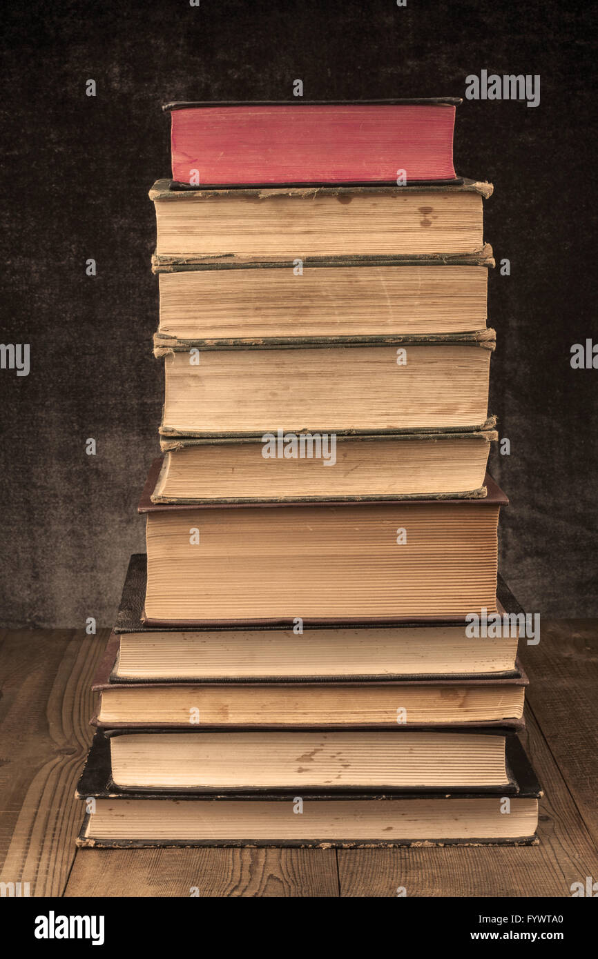 Old Books Pile On Wood Stock Photo - Alamy