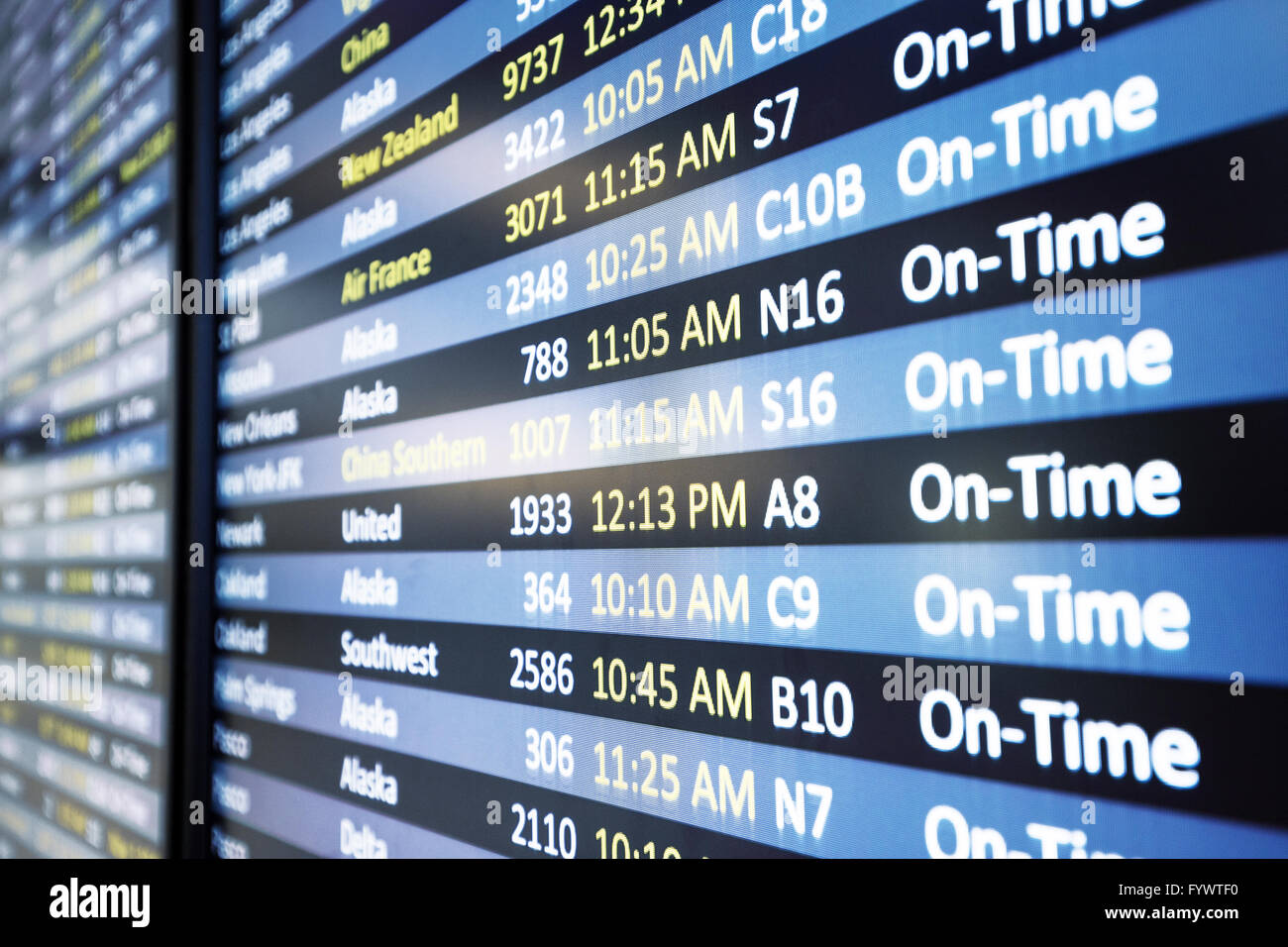 info of flight on billboard in airport Stock Photo - Alamy
