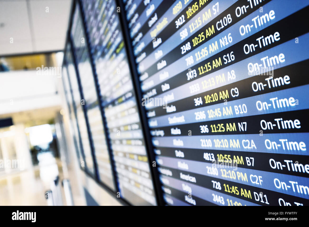 info of flight on billboard in airport Stock Photo - Alamy