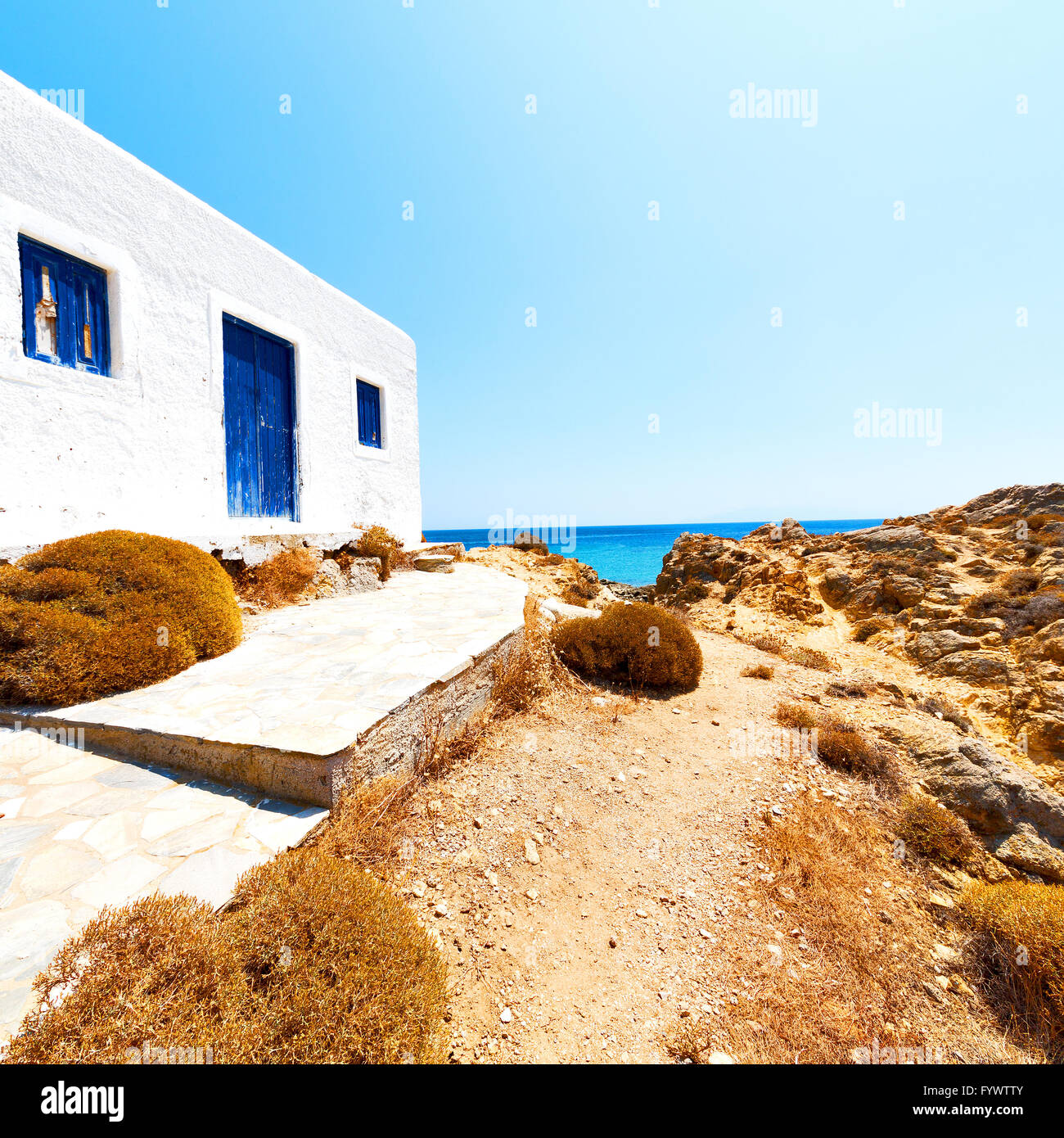 rock sea and beach in europe greece the mykonos island blue sky Stock ...