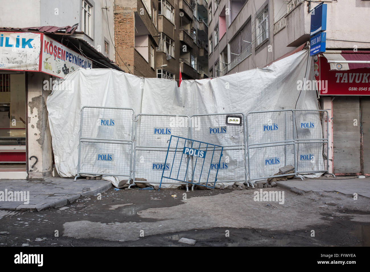 One of the barricades built by security forces to block the entrance of ...
