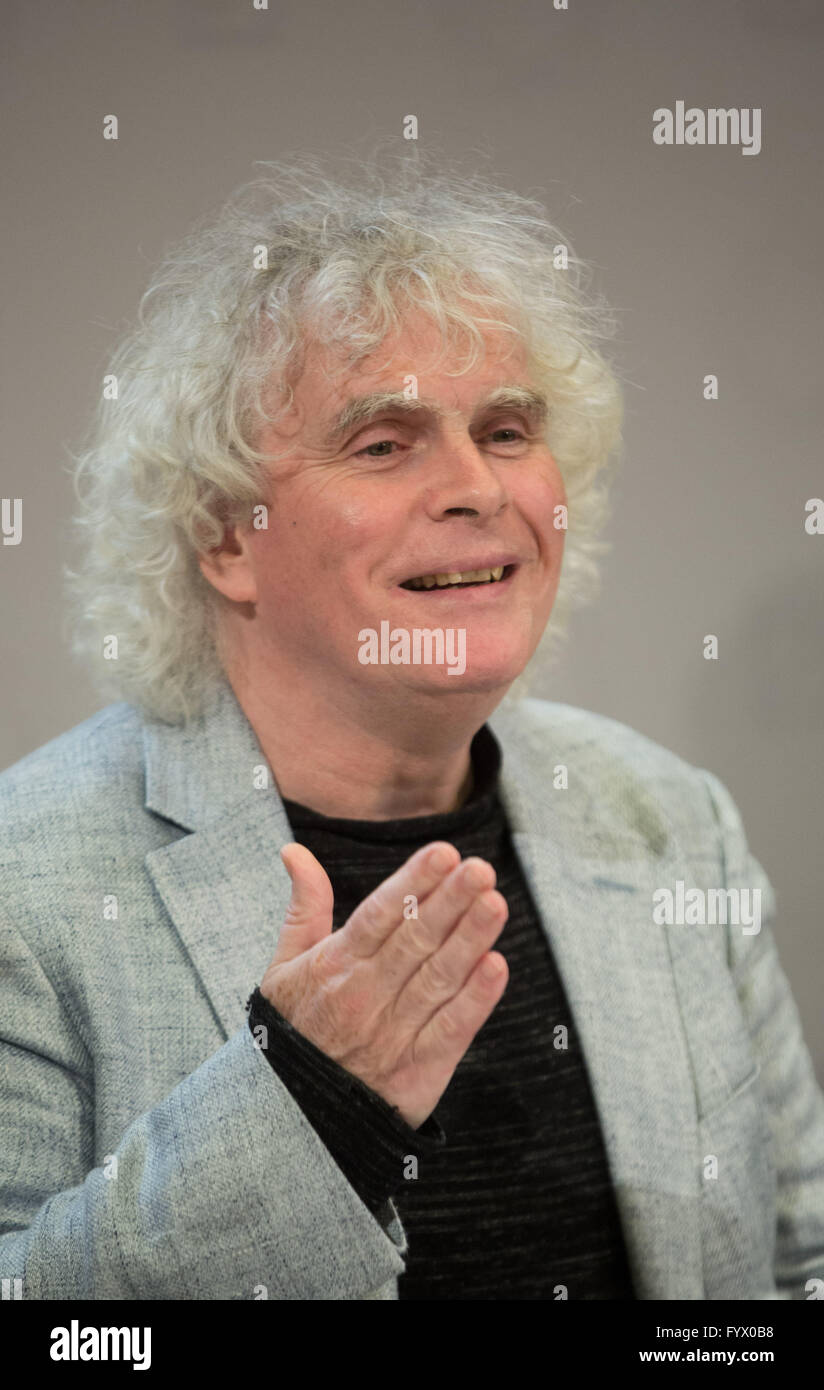 Berlin, Germany. 28th Apr, 2016. Conductor Sir Simon Rattle presents ...