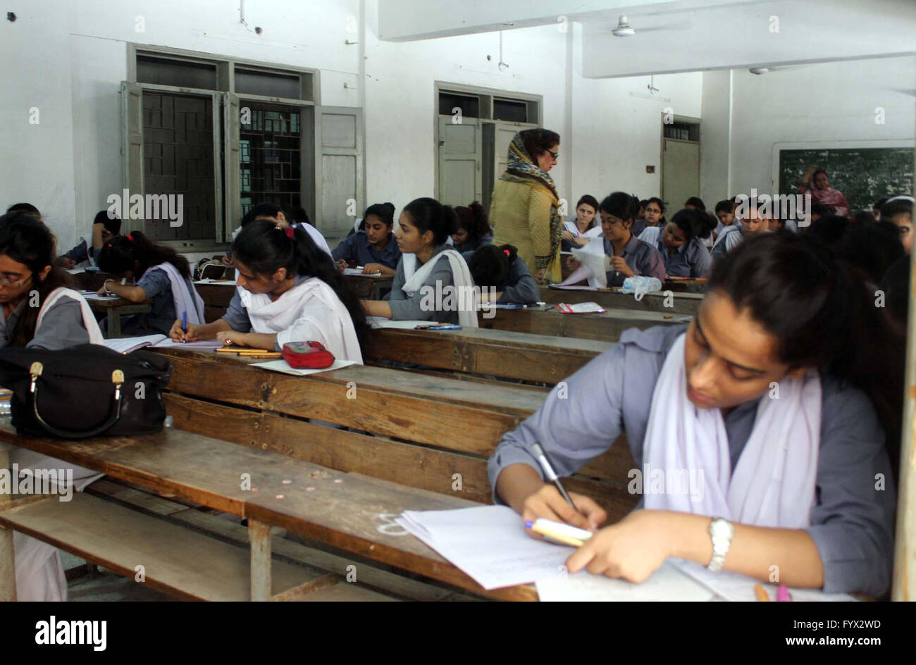 Intermediate students solving paper at examination hall during "Annual ...