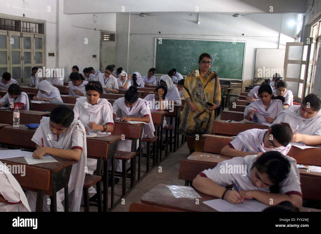 Intermediate students solving paper at examination hall during "Annual ...