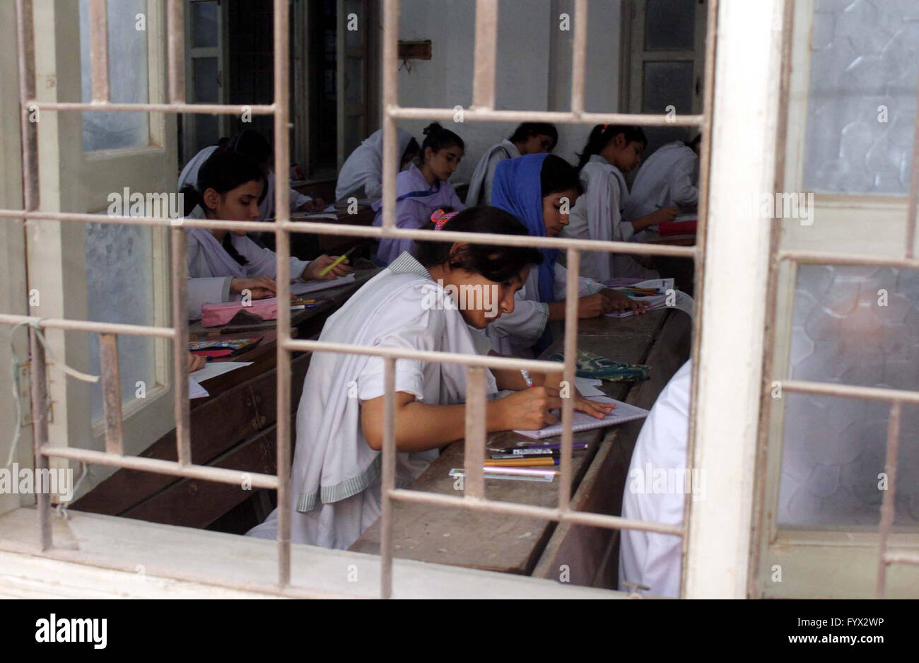 Intermediate students solving paper at examination hall during "Annual ...