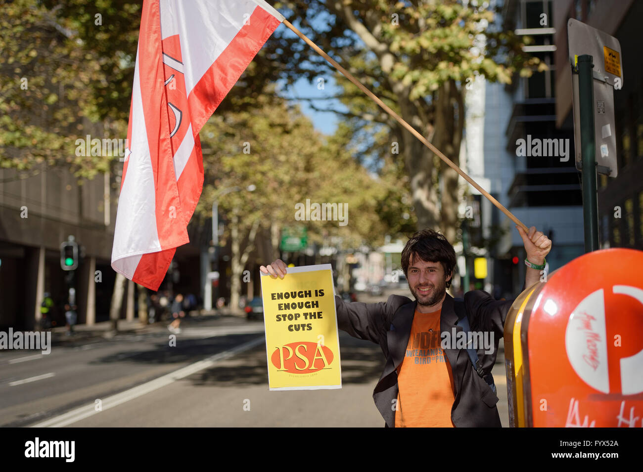 Sydney, Australia. 28th Apr, 2016. A Sydney TAFE staff member holds up ...
