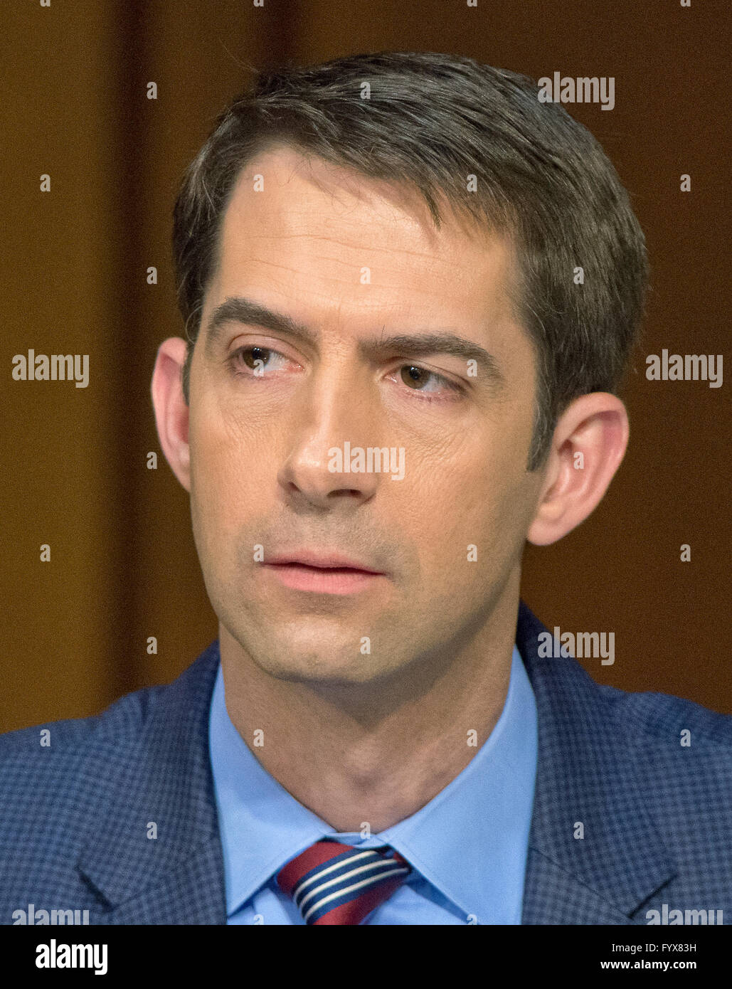 United States Senator Tom Cotton (Republican of Arkansas) listens as US ...