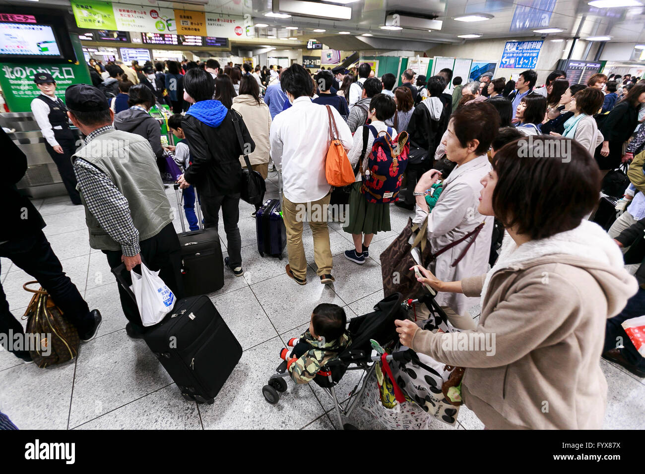 Passengers line up at Tokyo station on April 29, 2016, Tokyo, Japan ...
