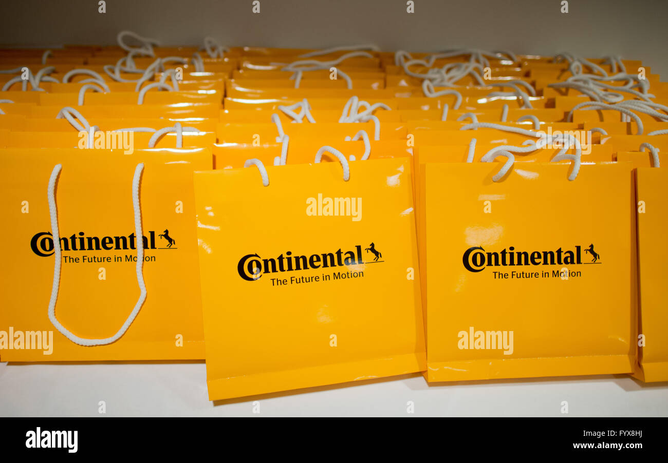 Hanover, Germany. 29th Apr, 2016. Employees handing out bags during the ...