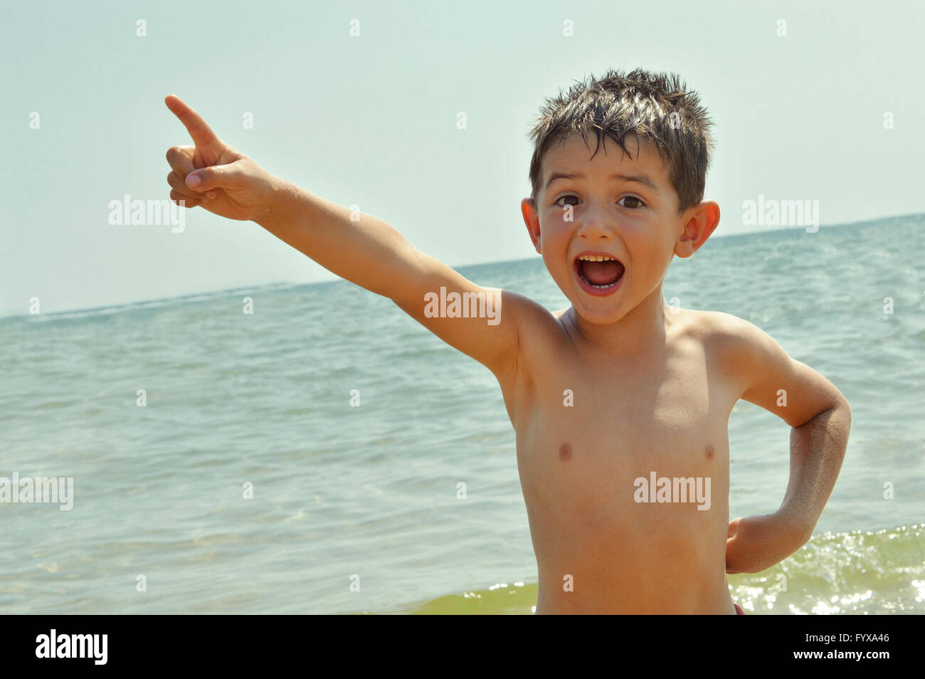 Kid shows with finger Stock Photo - Alamy