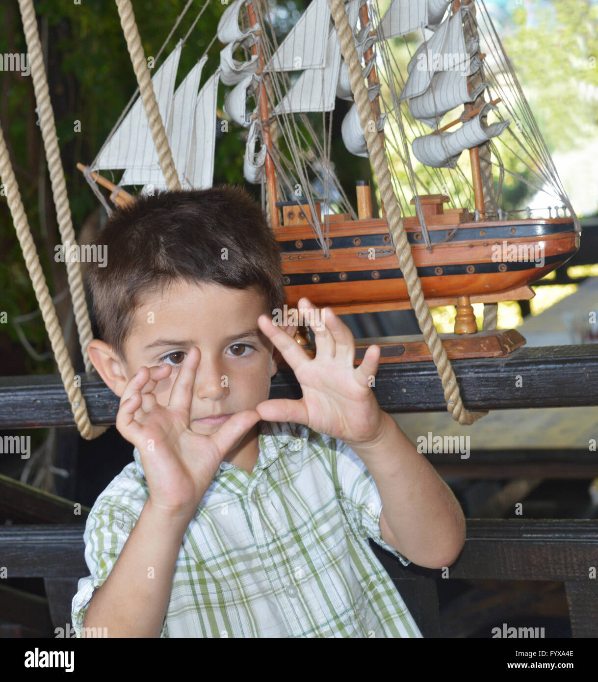 Kid shows something Stock Photo - Alamy