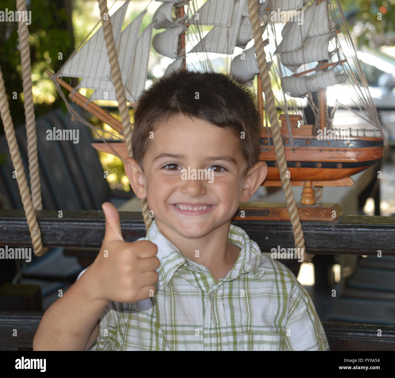 Boy shows OK Stock Photo - Alamy