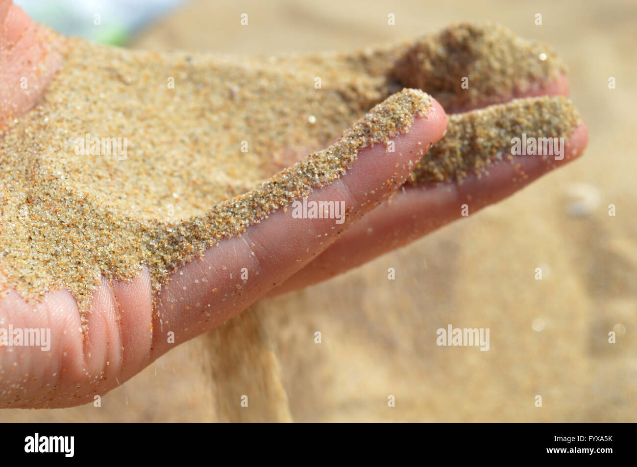 Flowing sand hi-res stock photography and images - Alamy