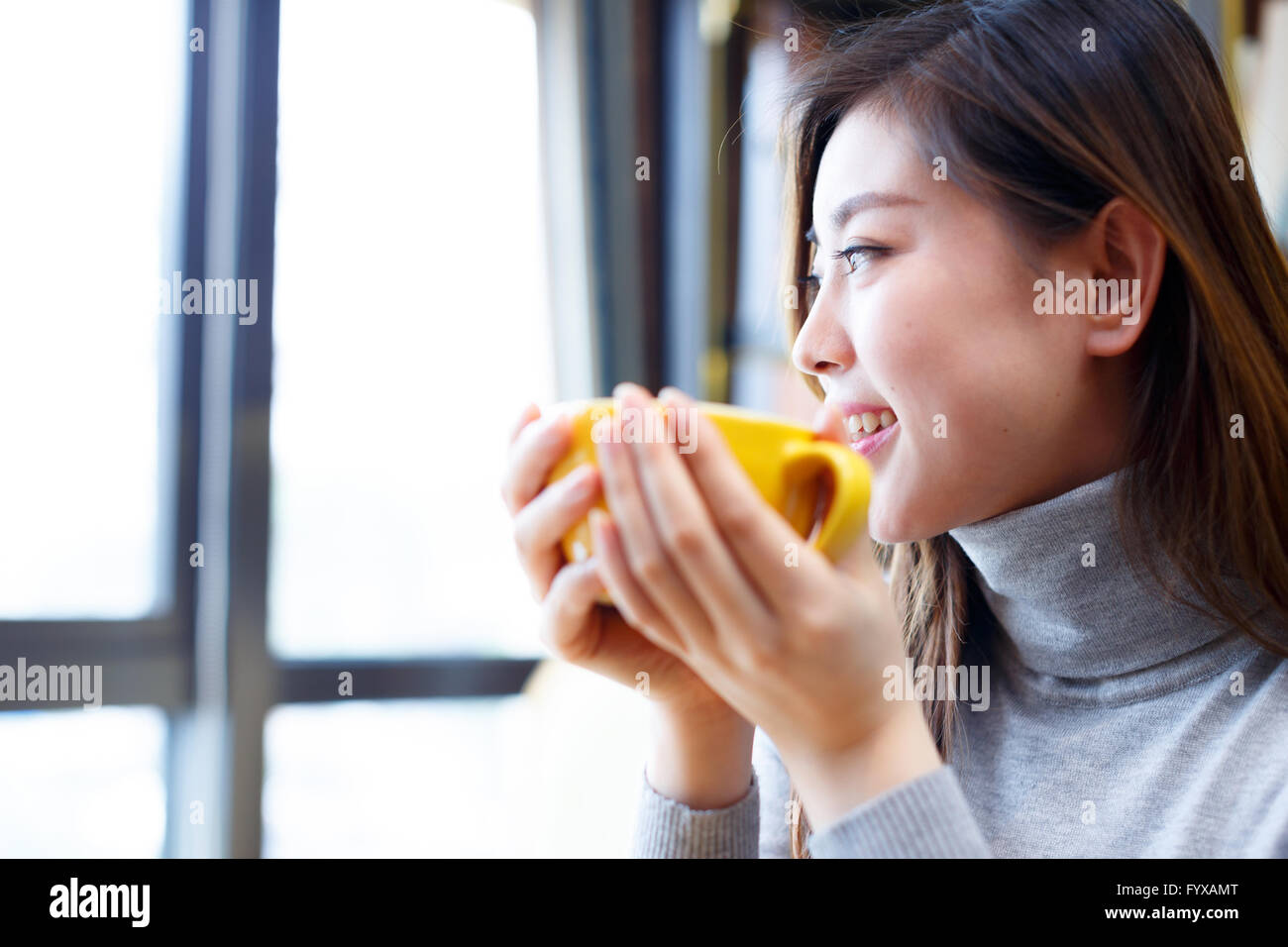 people relaxing in cafe Stock Photo - Alamy