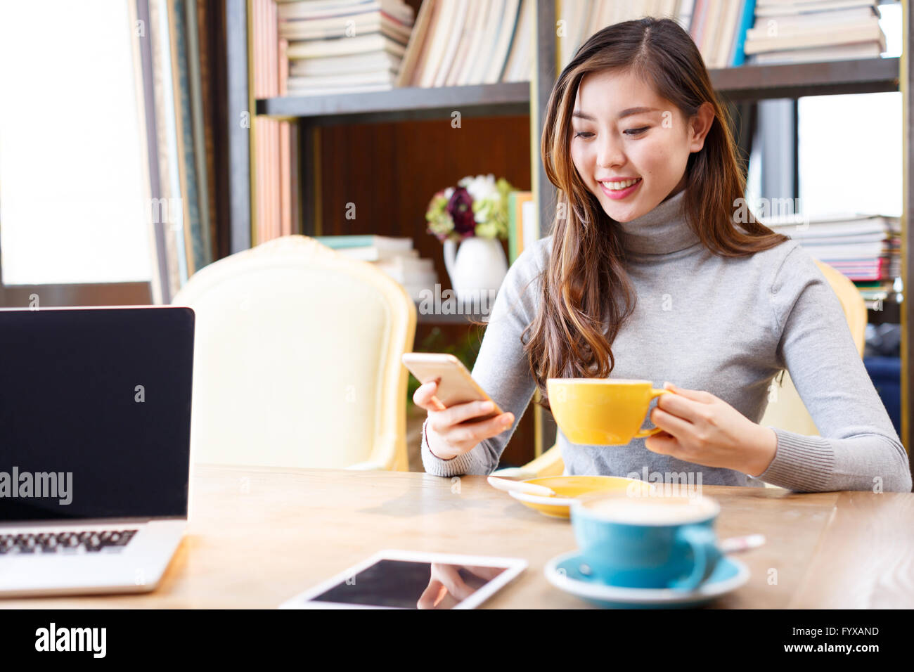people relaxing in cafe Stock Photo - Alamy