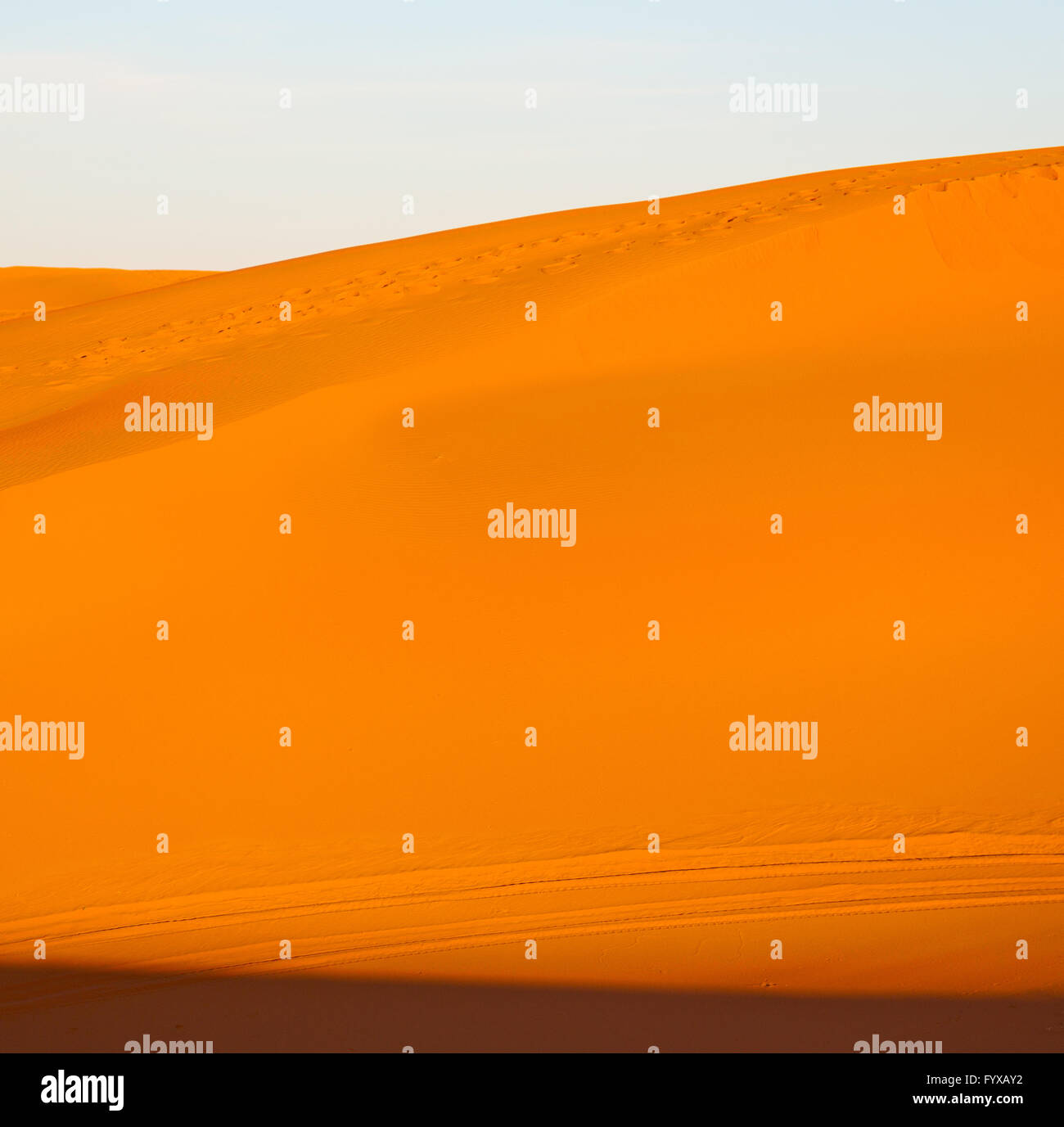 sunshine in the desert of morocco sand and dune Stock Photo - Alamy