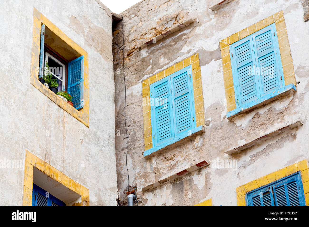 blue window in morocco africa old brown wall construction Stock Photo ...
